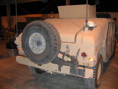 HMMWV Military Vehicle Tire Carrier - Rhino Industries, Inc.